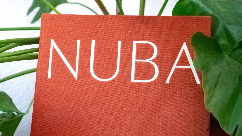 Origen: El Viaje que Define la Esencia de NUBA - aleteo